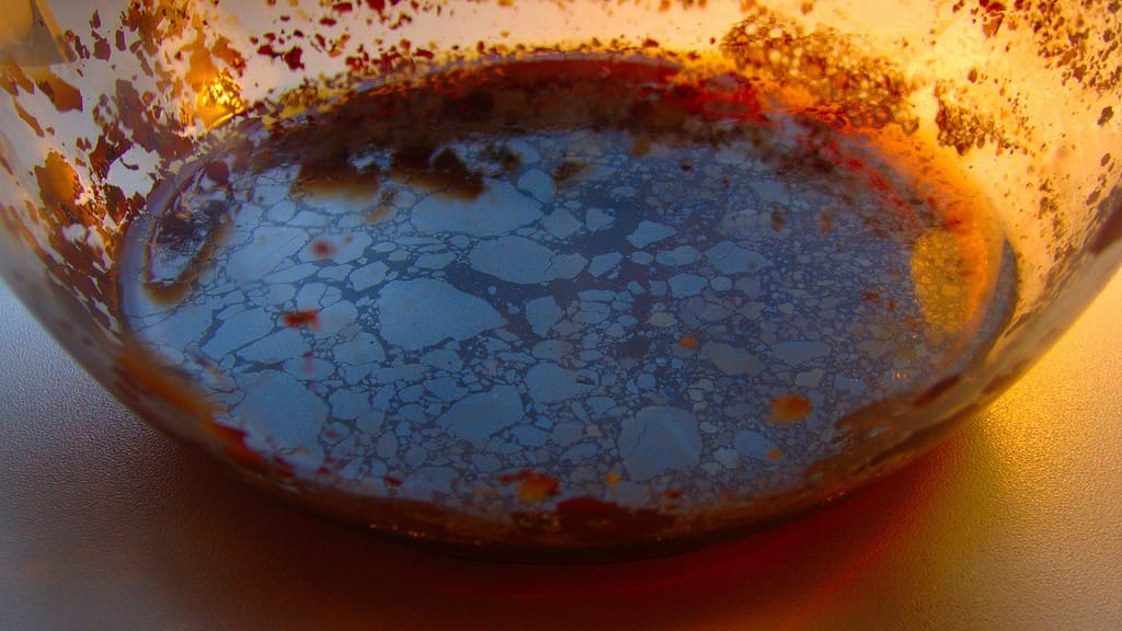 Scum on the tea from a teasmade